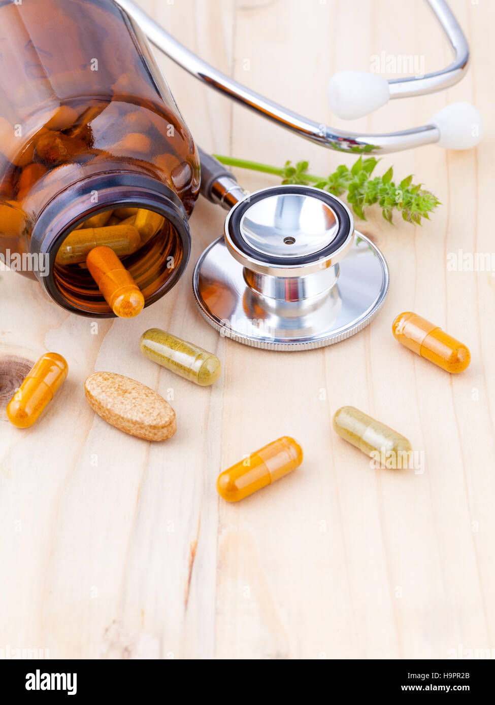 capsule of herbal medicine alternative healthy care with stethos Stock ...