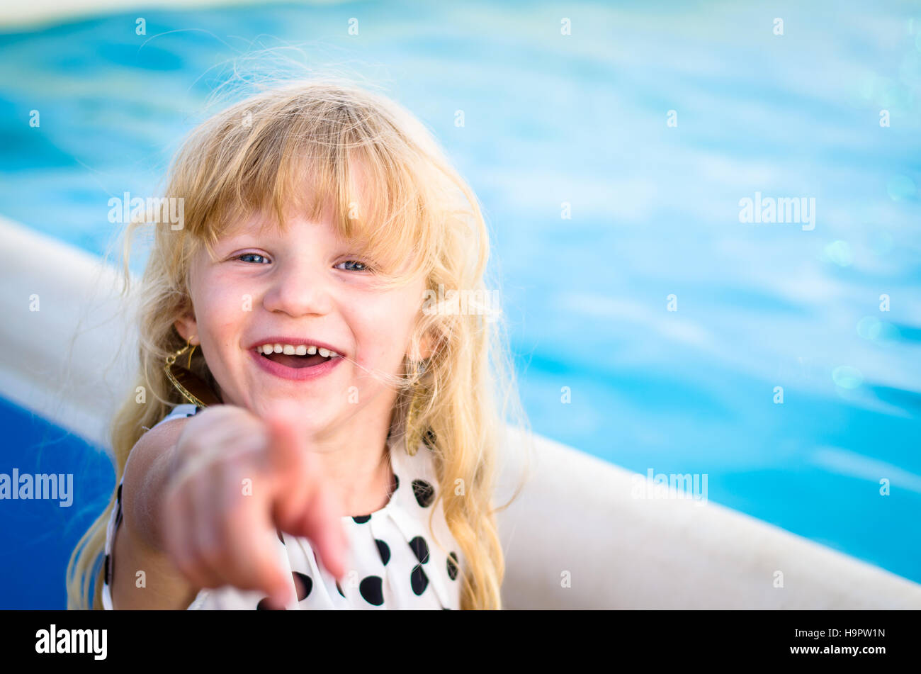 Girl pointing out hi-res stock photography and images - Alamy