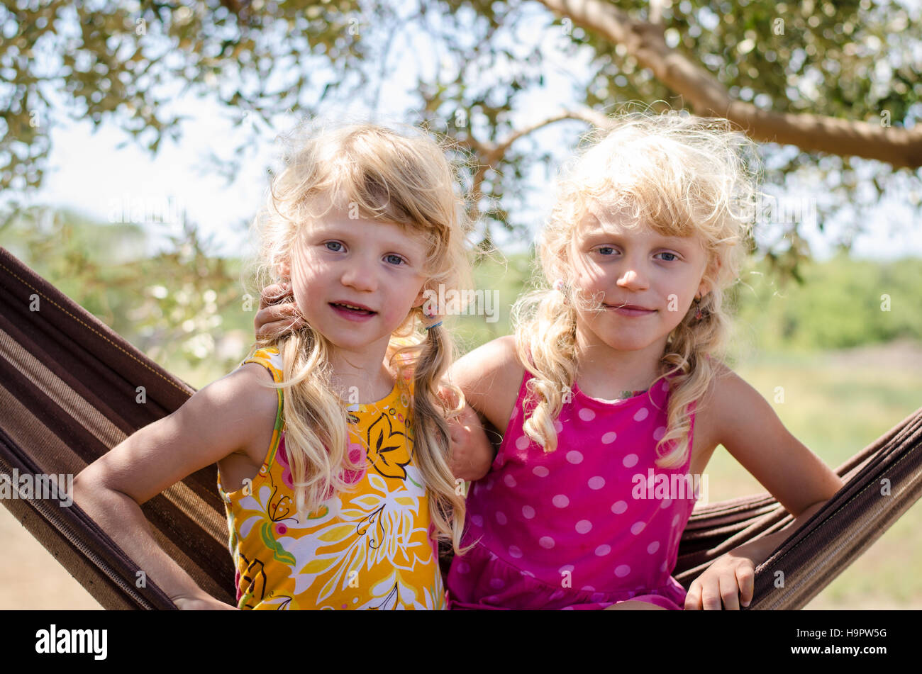 Girl sitting kids hi-res stock photography and images - Alamy