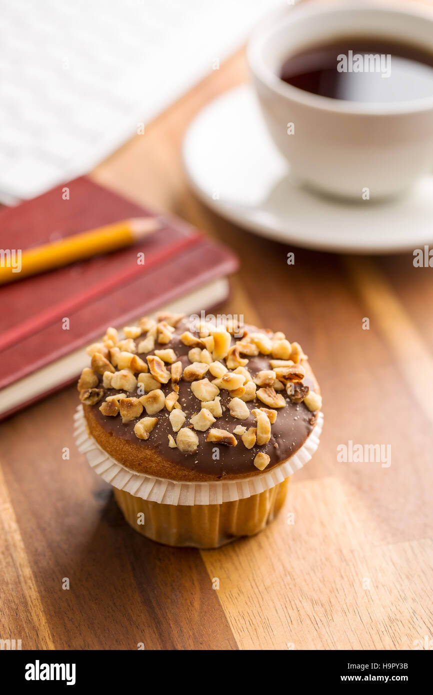 Break for coffee and muffin at the office. Concept with coffee, muffin ...