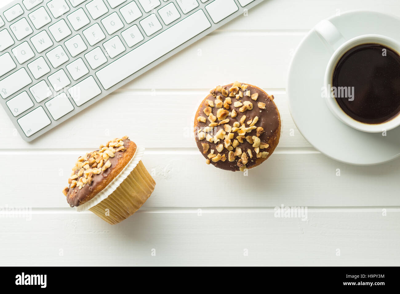 Break for coffee and muffin at the office. Concept with coffee, muffin ...
