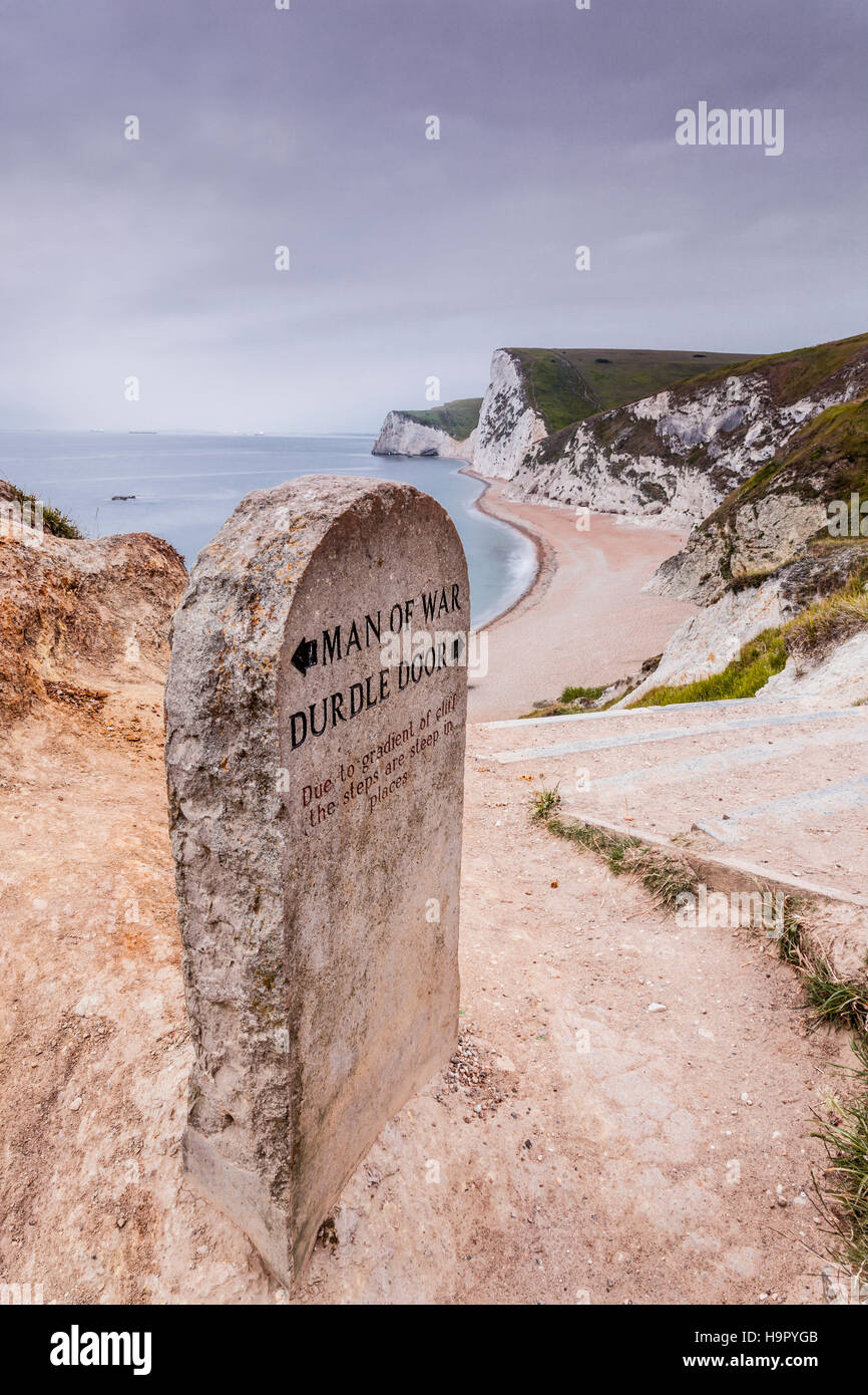 The stone sign at Durdle Door in Dorset Stock Photo - Alamy