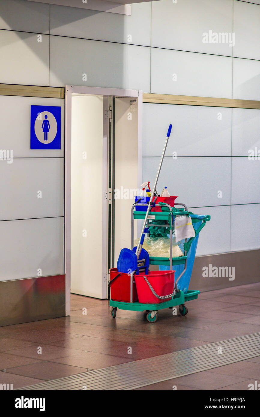 cleaning public bathrooms in modern building Stock Photo - Alamy