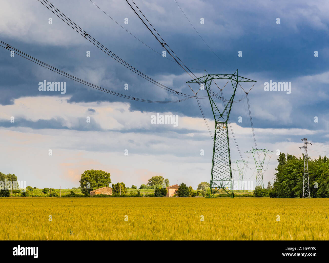 high voltage pylons in countryside Stock Photo - Alamy
