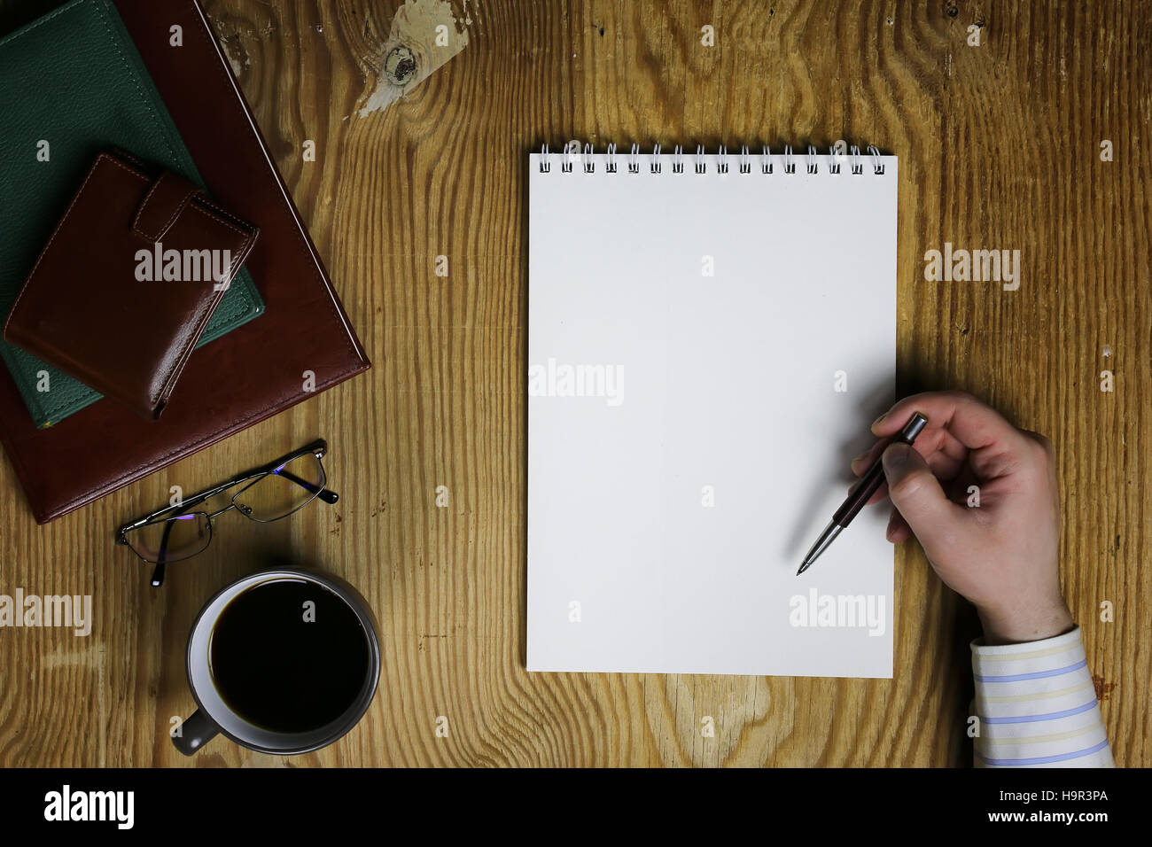 table write hand office view Stock Photo - Alamy