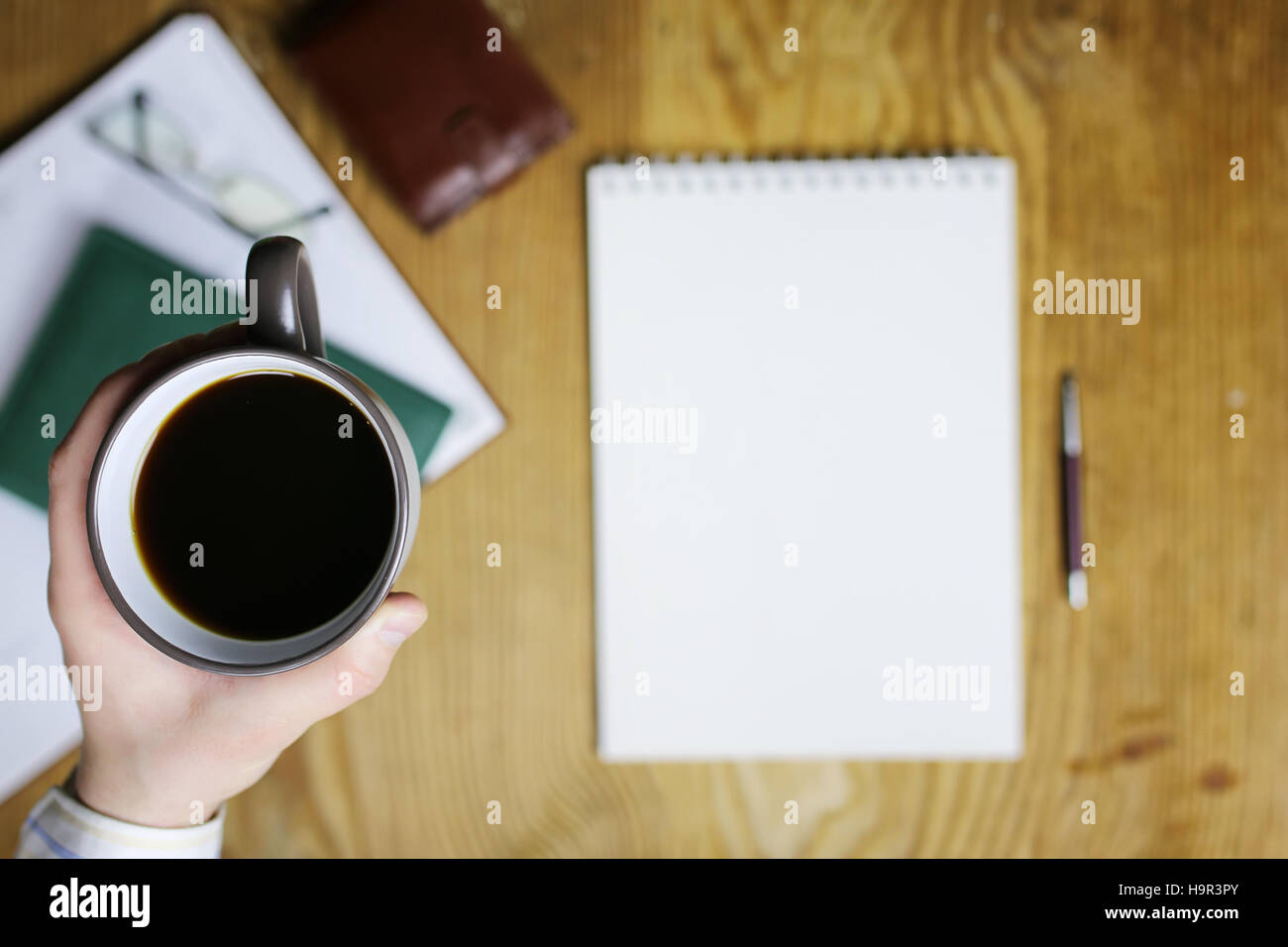 table write hand office view Stock Photo - Alamy