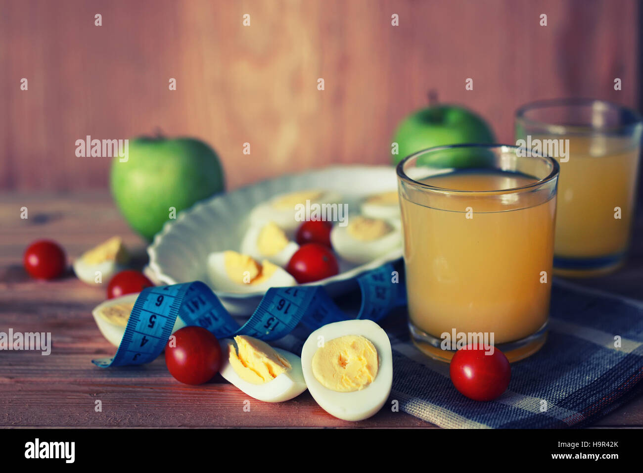 egg breakfast fruit wooden background Stock Photo - Alamy