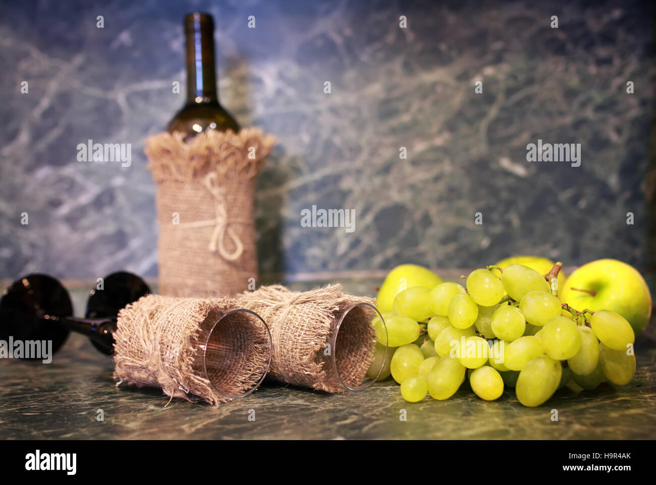 table with wine bottle grape Stock Photo - Alamy