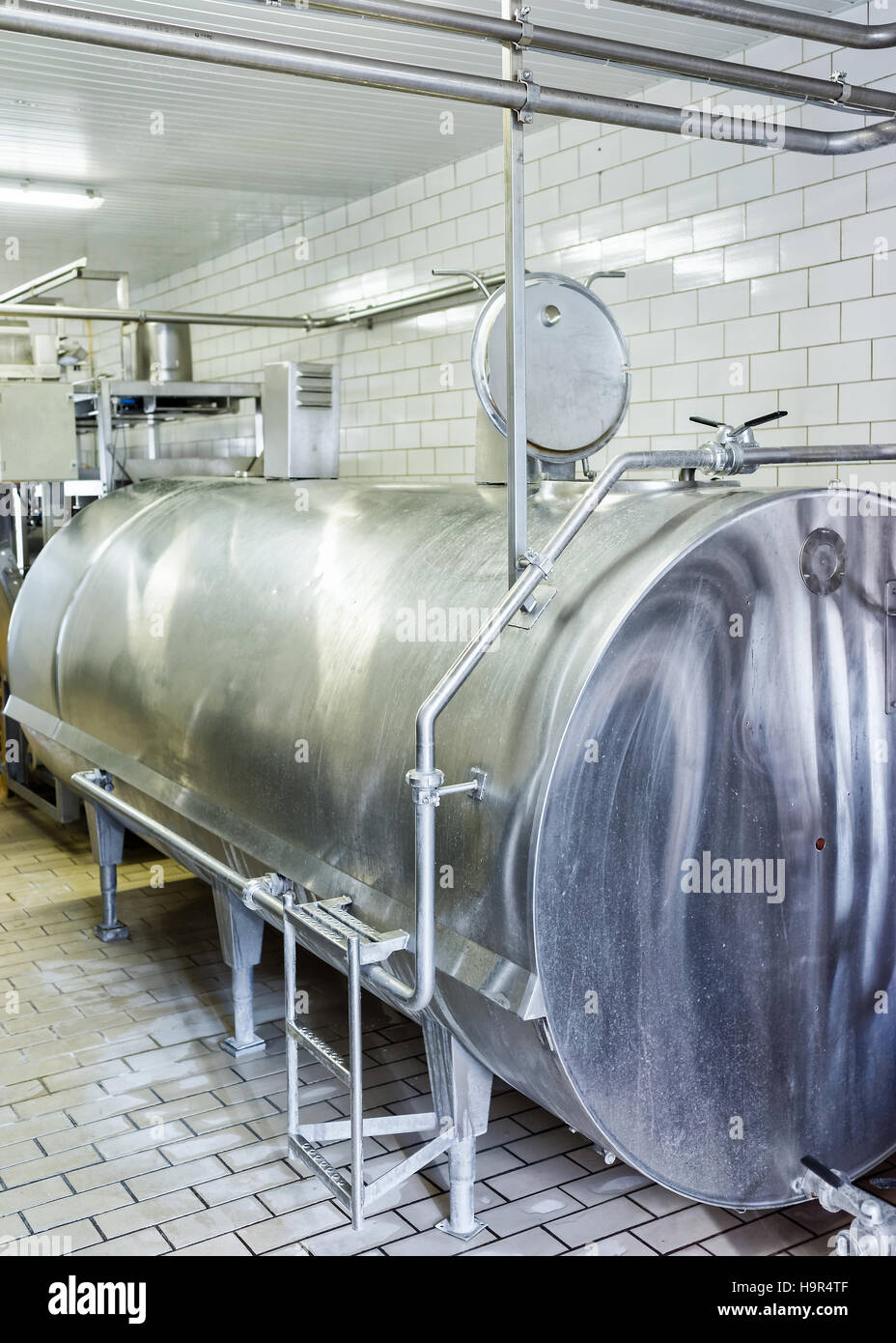 Liquid storage tank and pipe in the dairy for the production of Gruyere ...