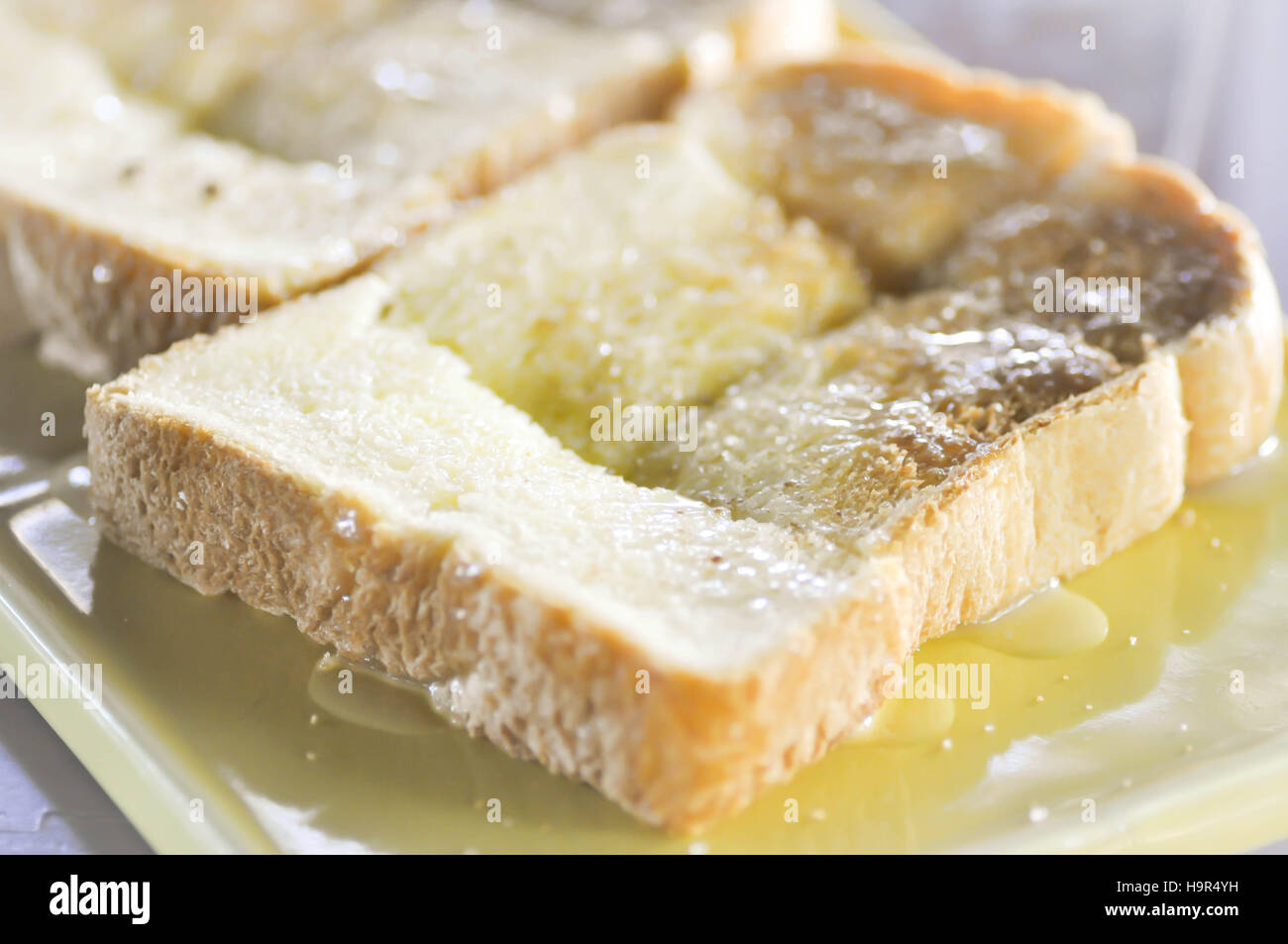 toast with butter topping dish Stock Photo - Alamy