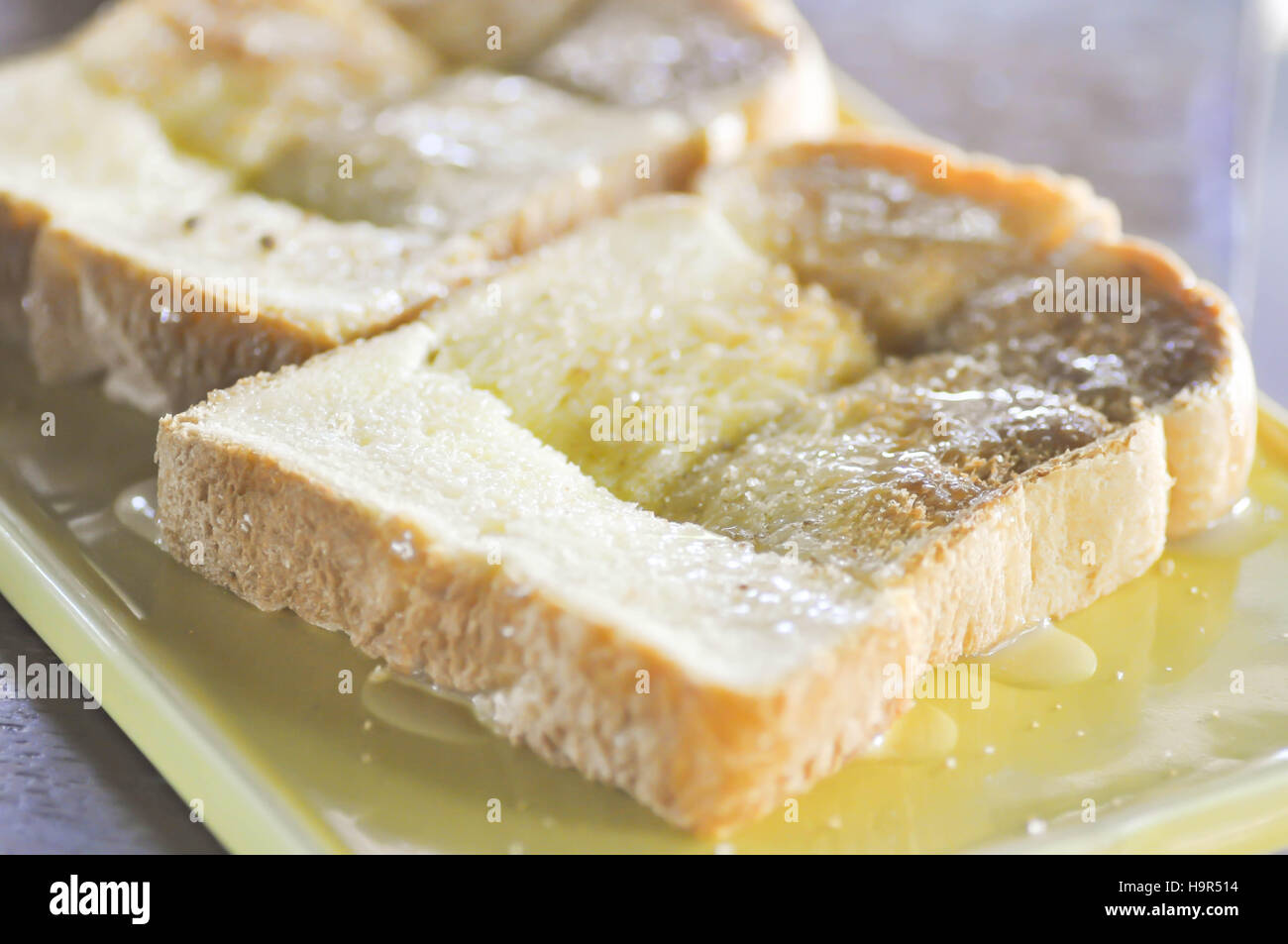 toast with butter topping dish Stock Photo - Alamy