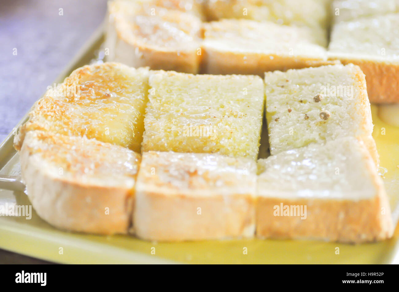 toast with butter topping dish Stock Photo - Alamy