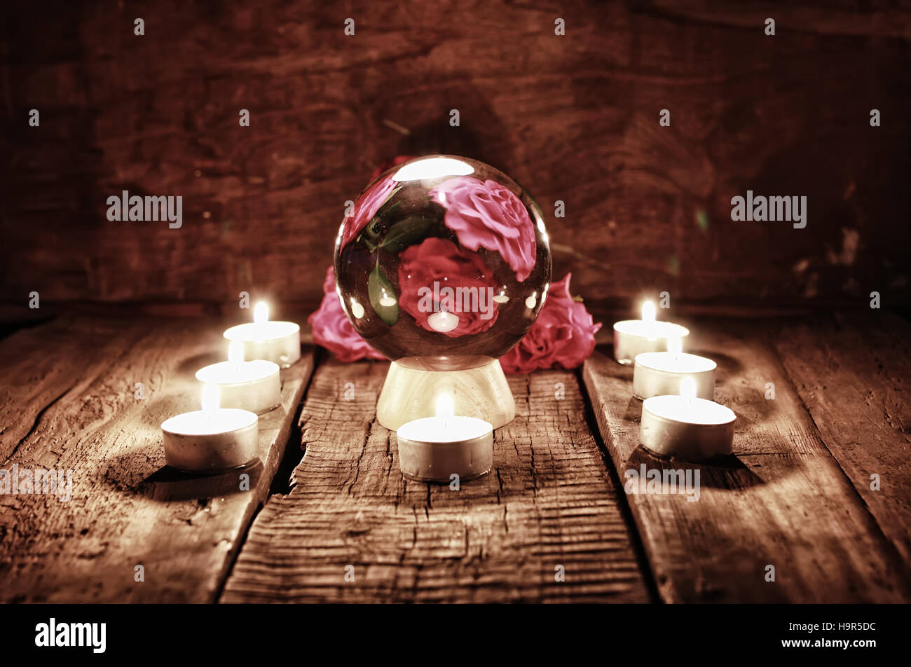 future teller candle divination Stock Photo - Alamy