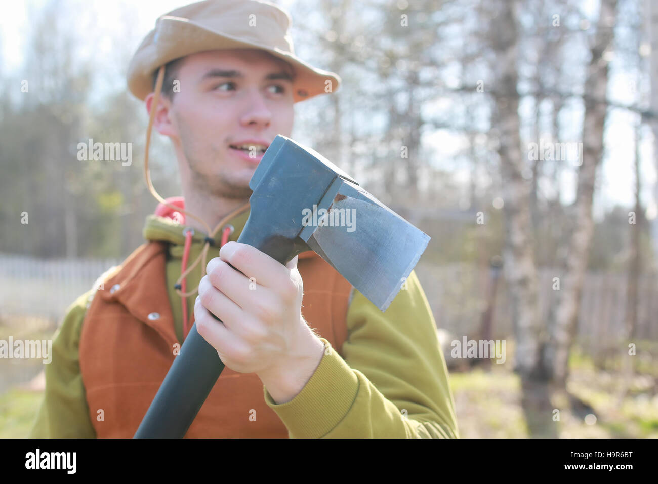 man outdoor with axe Stock Photo - Alamy