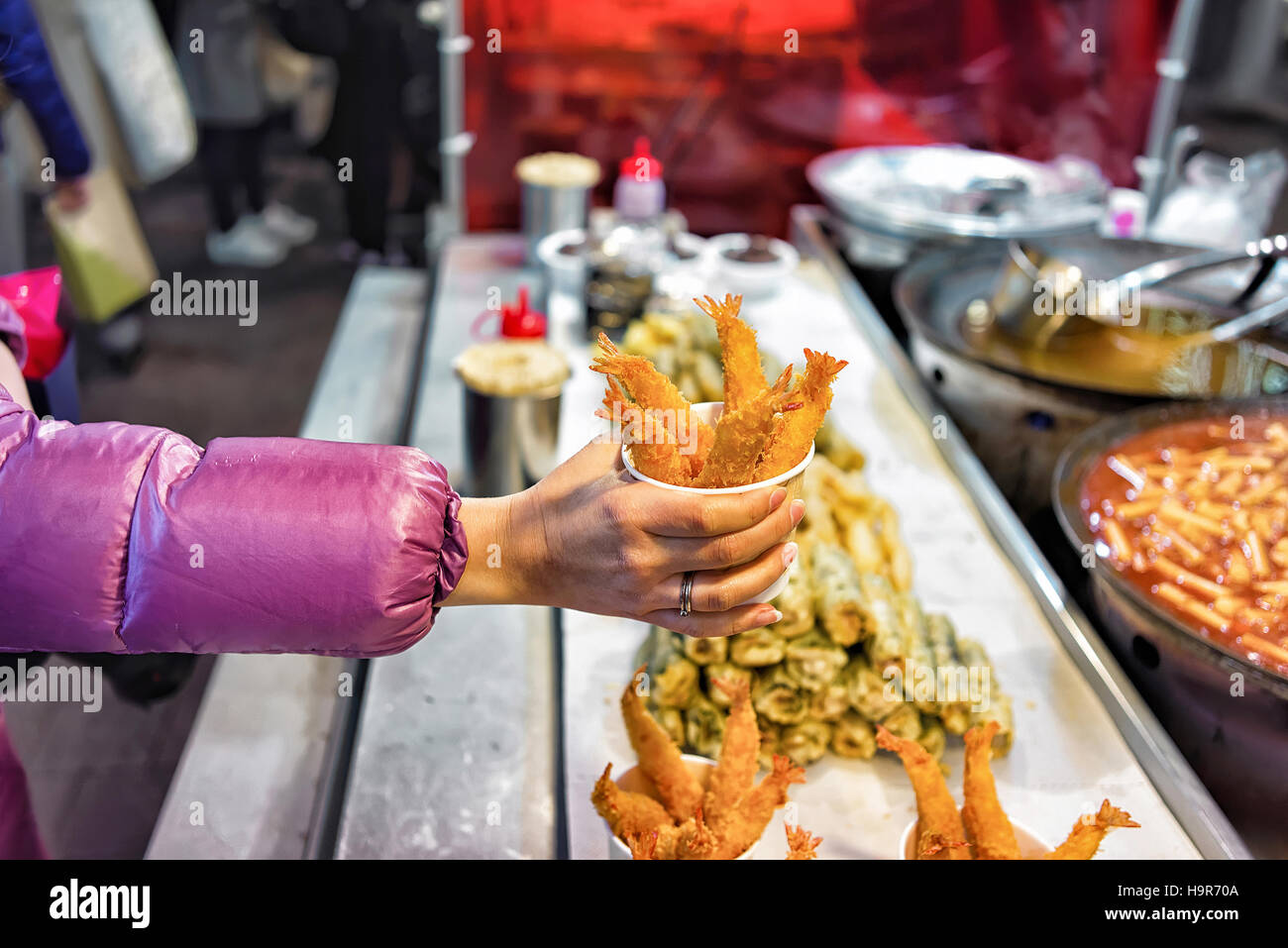 Seafood stall with fried prawns at Myeongdong open street market in ...