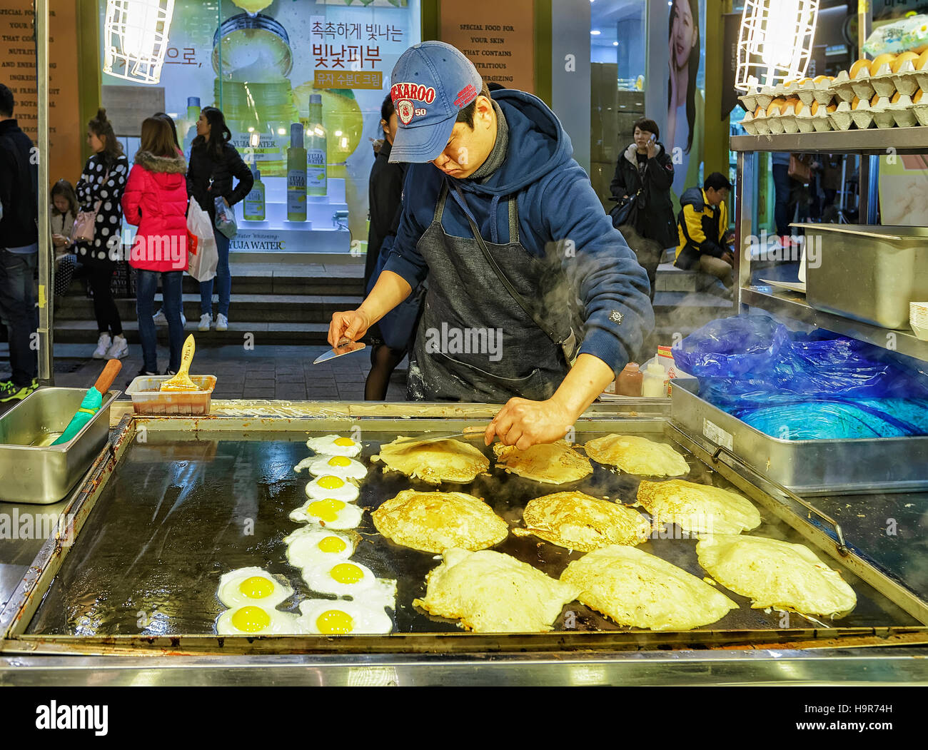 Seoul, South Korea - March 14, 2016: Seller of pancakes at Myeongdong ...