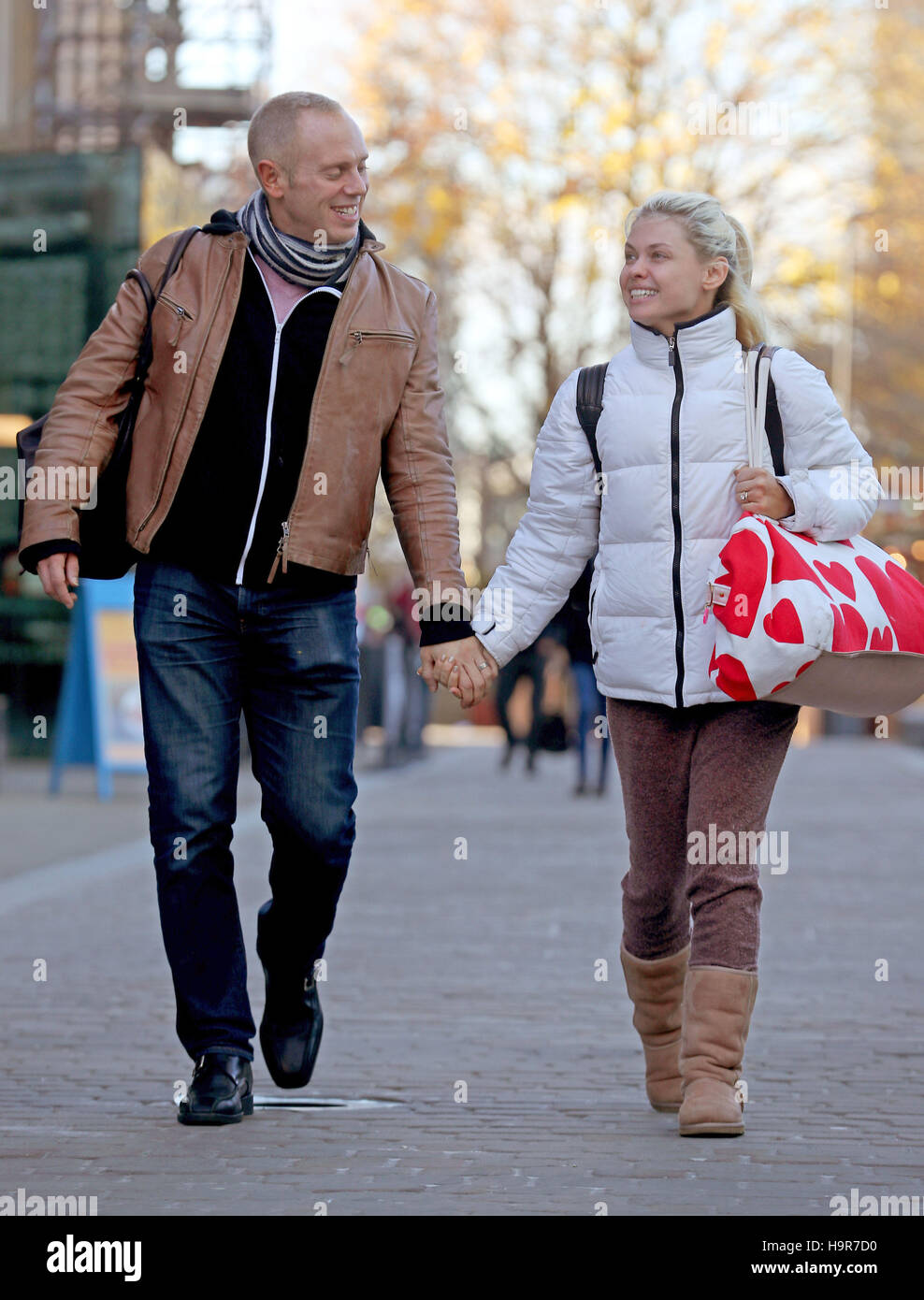Judge Robert Rinder and Oksana Platero walk through Manchester, on ...