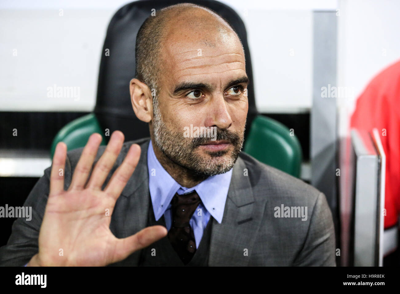 Man City coach Pep Guardiola on the bench before the Champions League ...