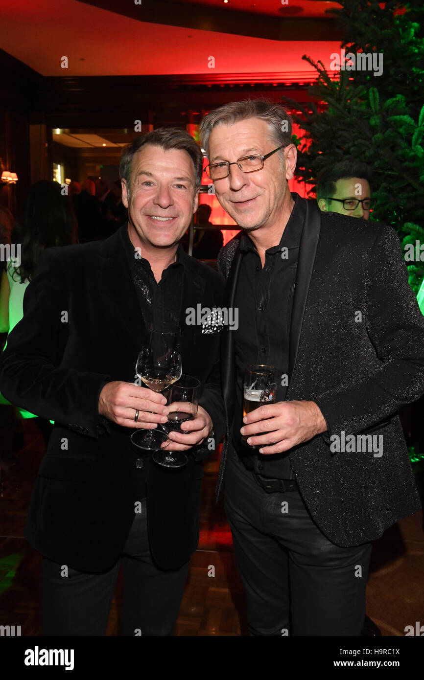 Munich, Germany. 24th Nov, 2016. Singer Patrick Lindner (l) and Peter Schaefer pose during the ...
