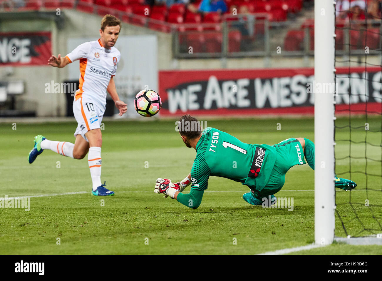 Goalkeeper Jerrad Tyson of the Western Sydney Wanderers manages to ...