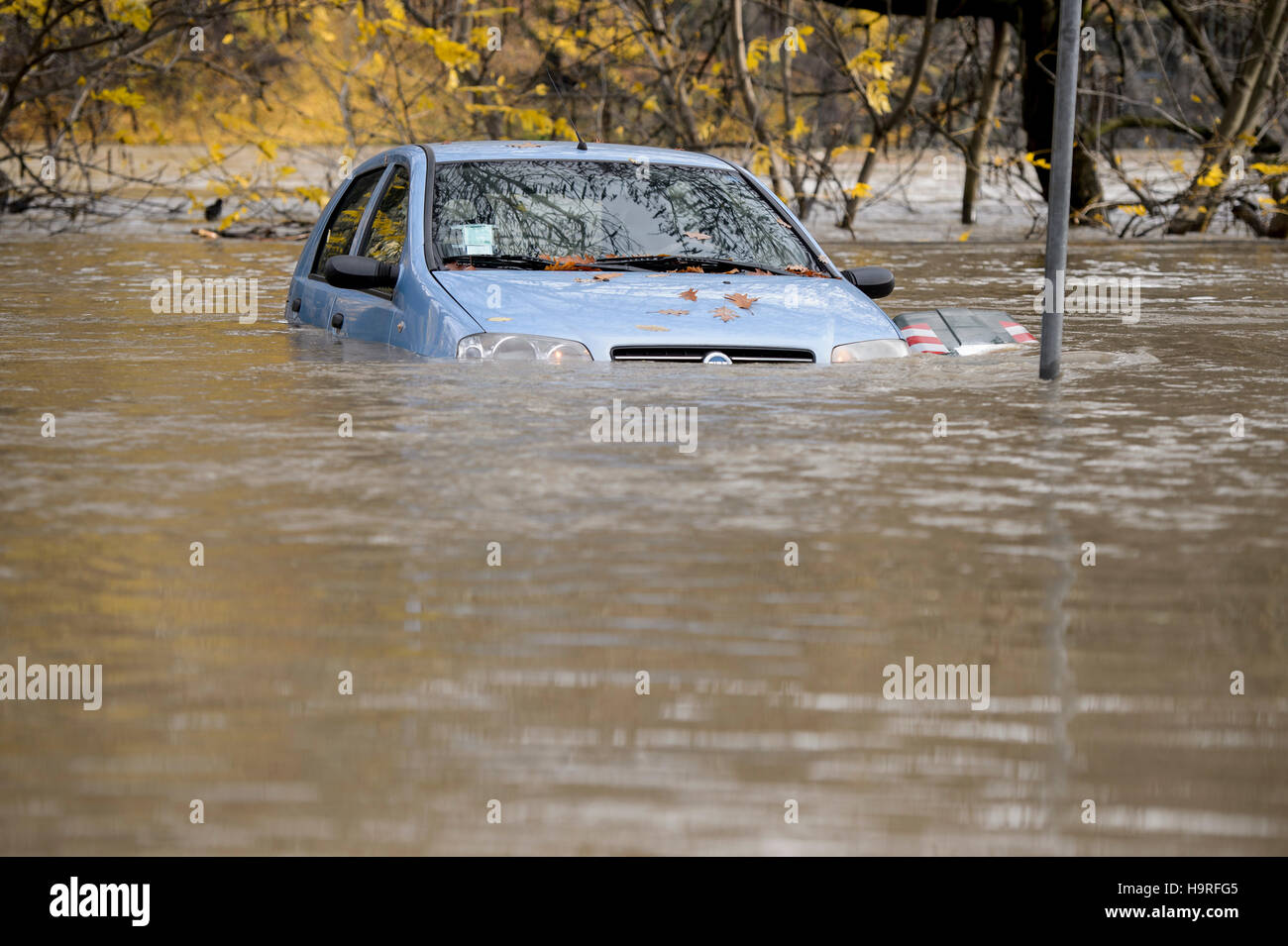 Turin, Italy. 25 november 2016: A car is submerged in water after flood ...