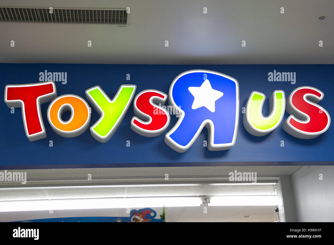 A Toys''R''Us signboard on display at its retail store in Sunshine City ...