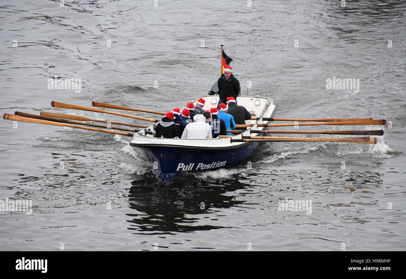 Bremen, Germany. 26th Nov, 2016. An 11-man team of rowers in action on ...