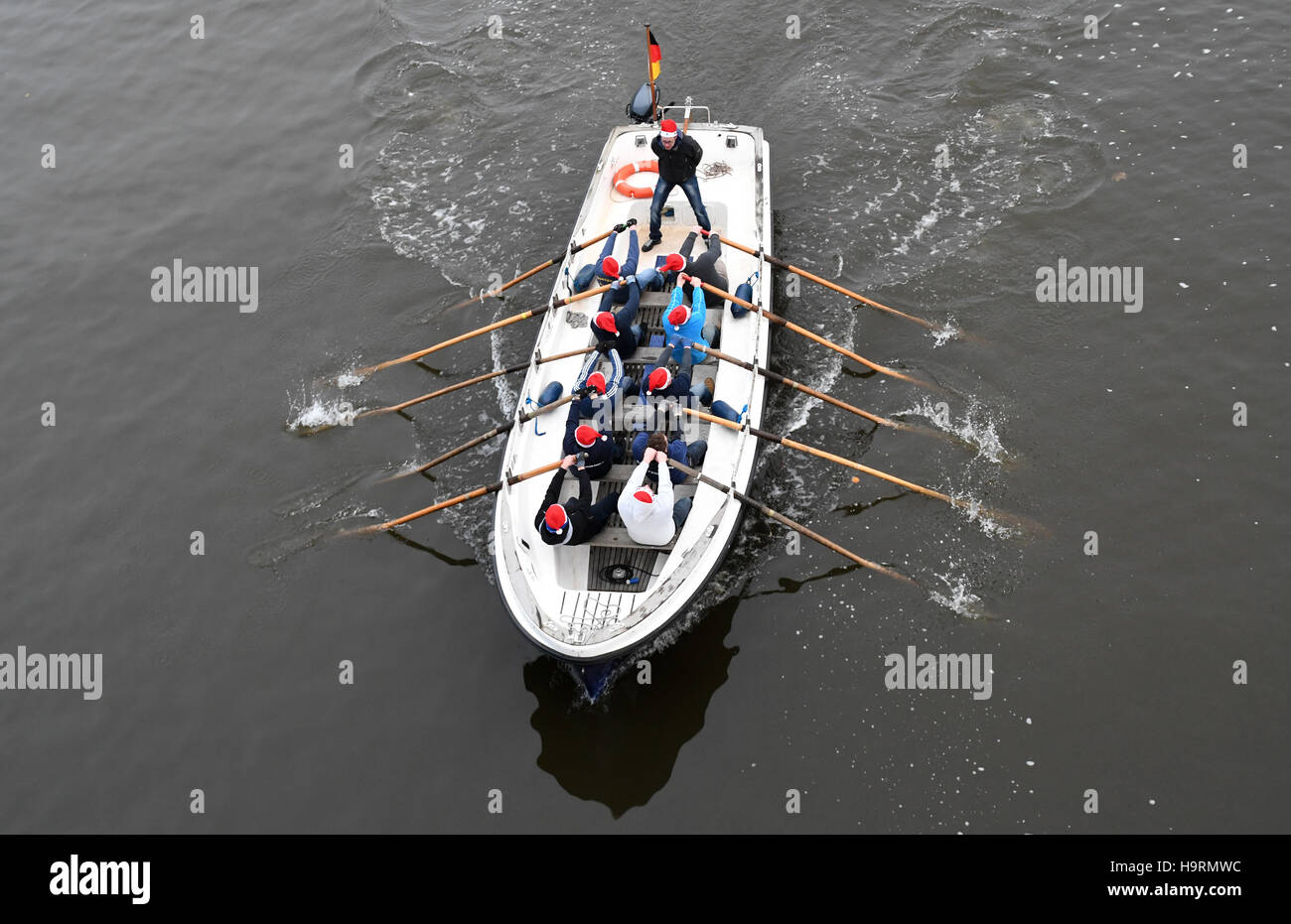Bremen, Germany. 26th Nov, 2016. An 11-man team of rowers in action on ...