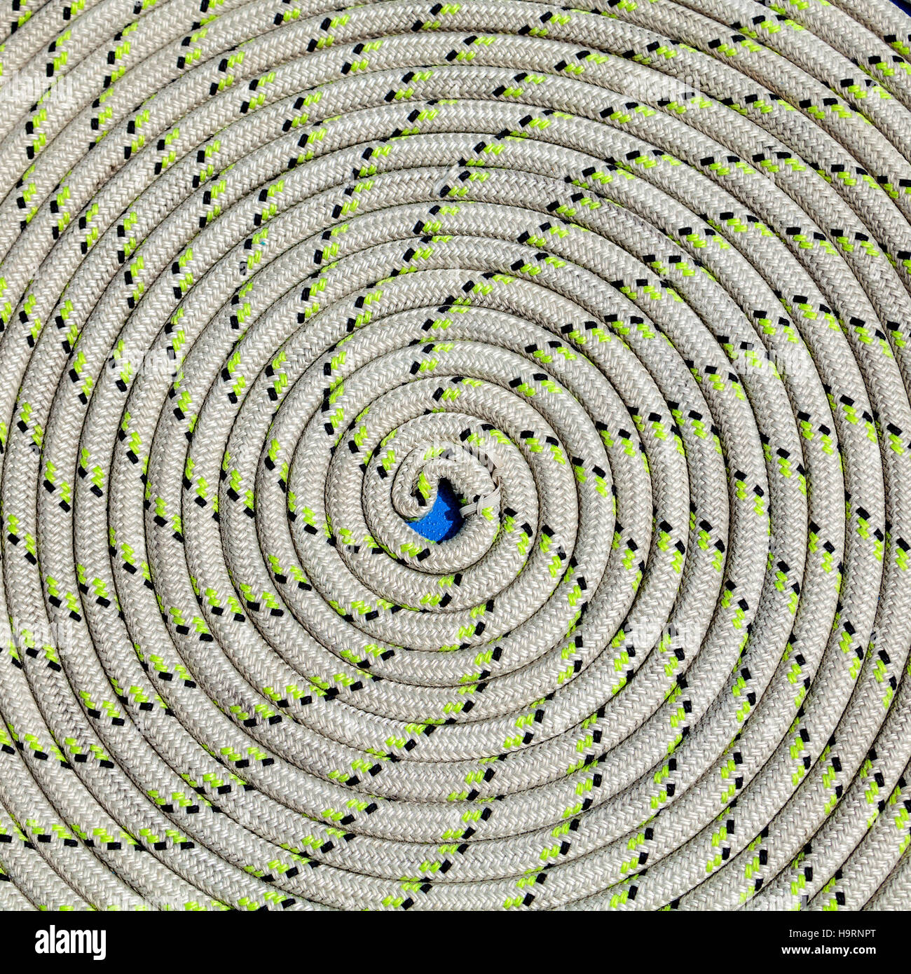 The rope wrapped in a spiral on sailboat yacht detail Stock Photo - Alamy