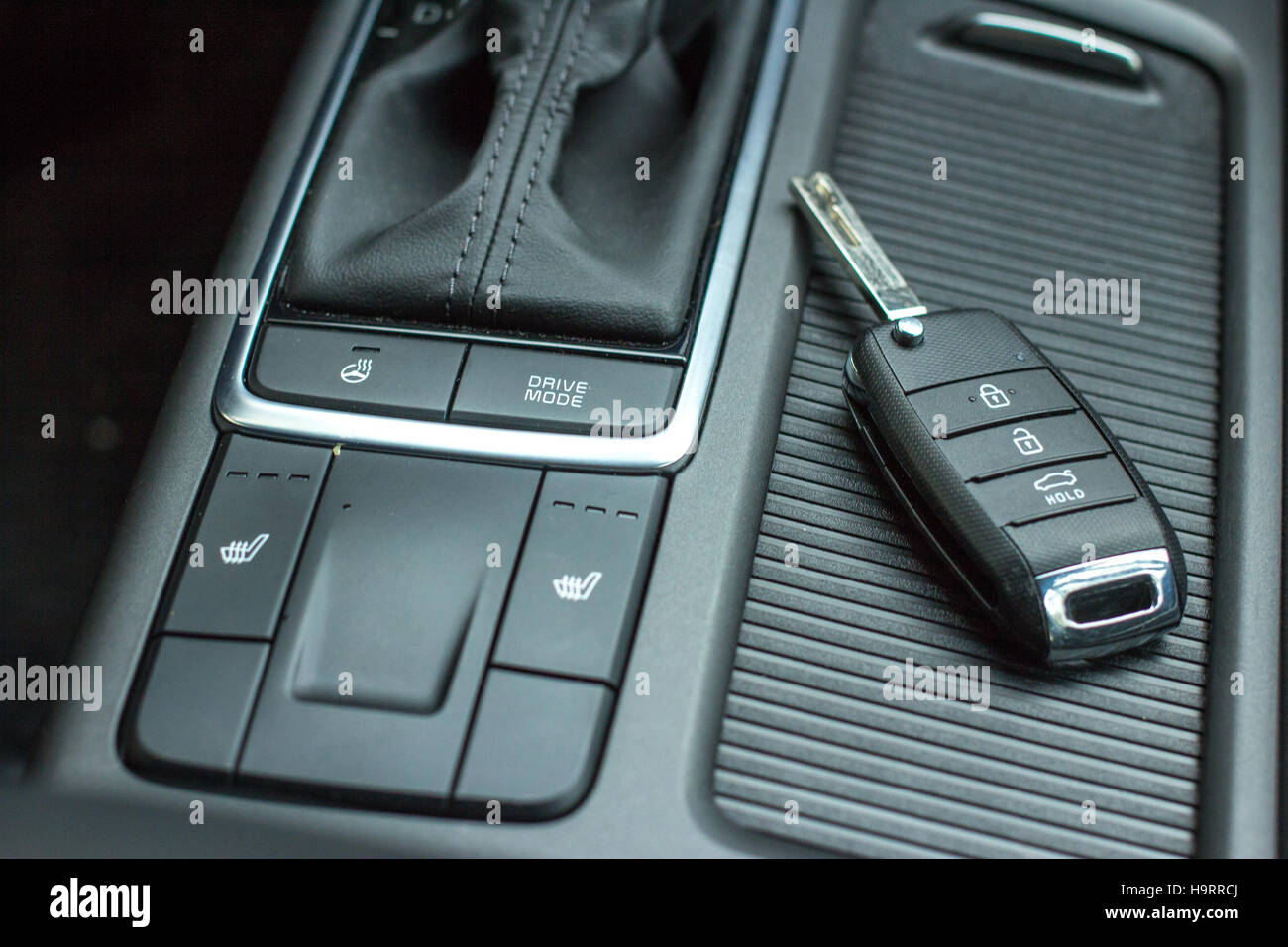 Modern Car remote control key in vehicle interior Stock Photo - Alamy