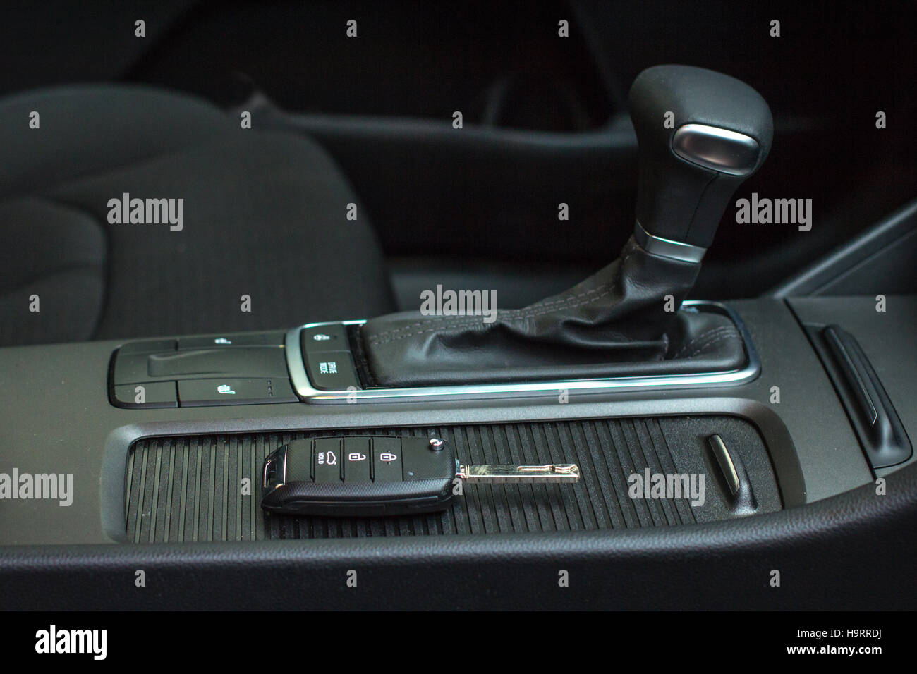 Modern Car remote control key in vehicle interior Stock Photo - Alamy