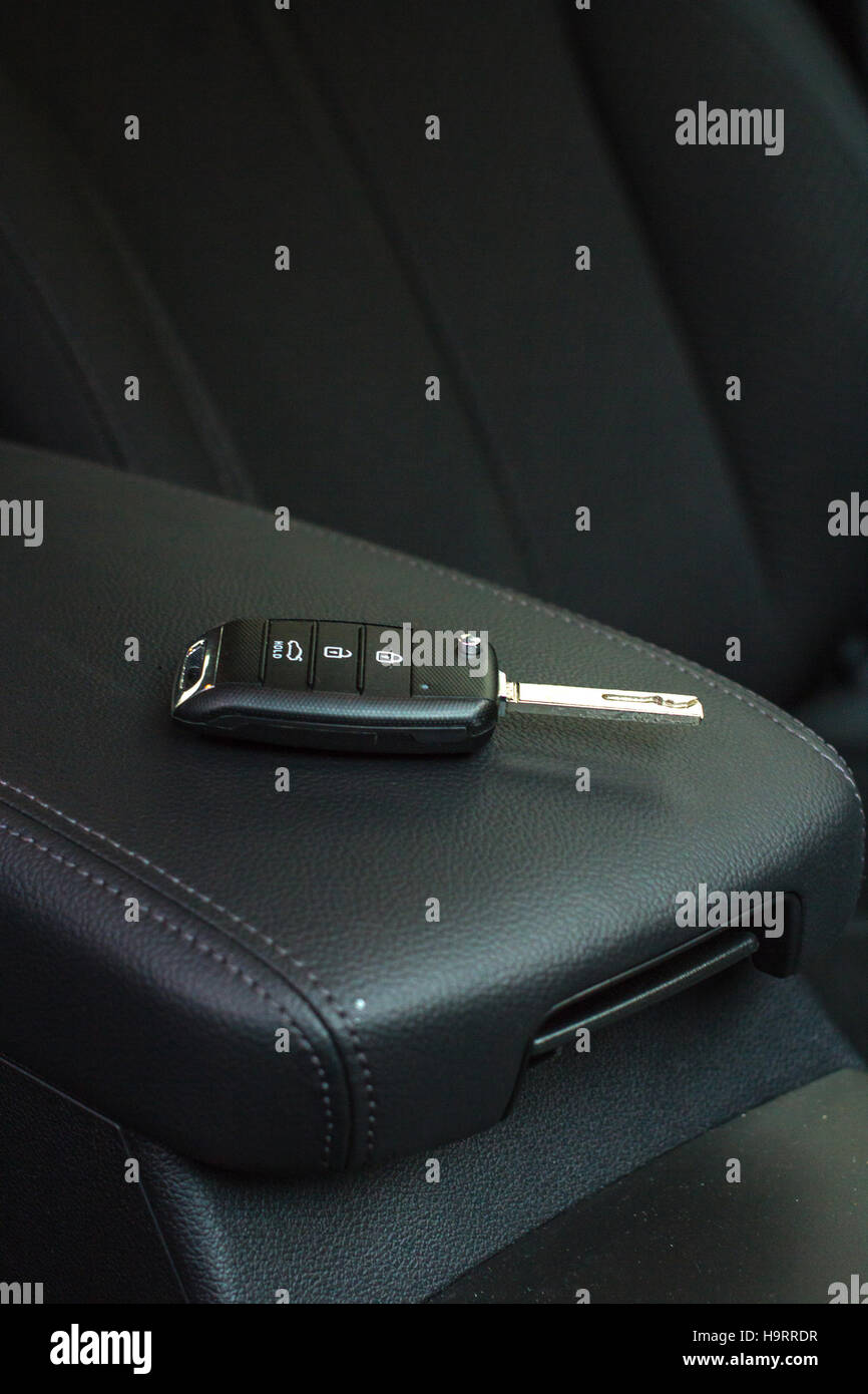 Modern Car remote control key in vehicle interior Stock Photo - Alamy