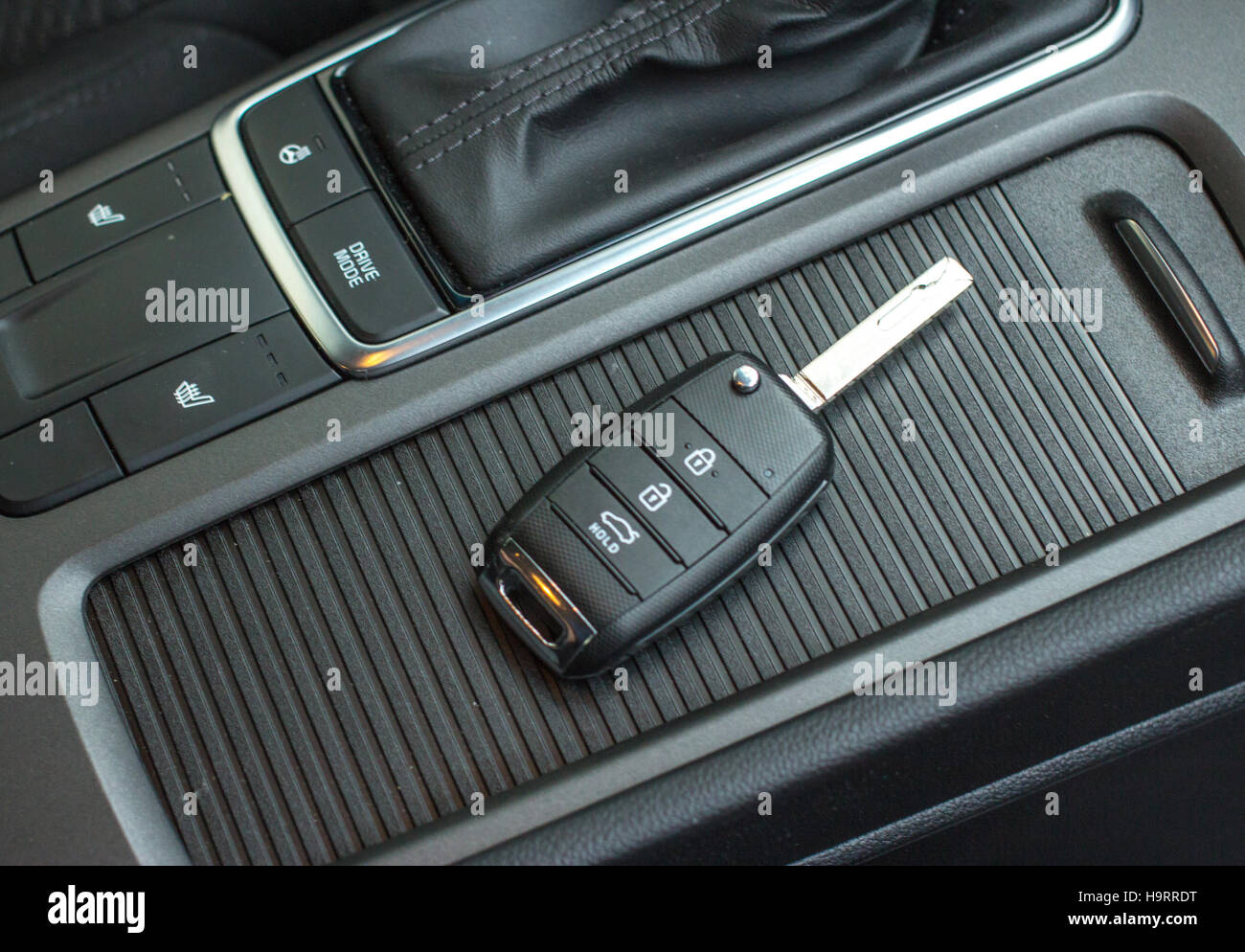 Modern Car remote control key in vehicle interior Stock Photo - Alamy