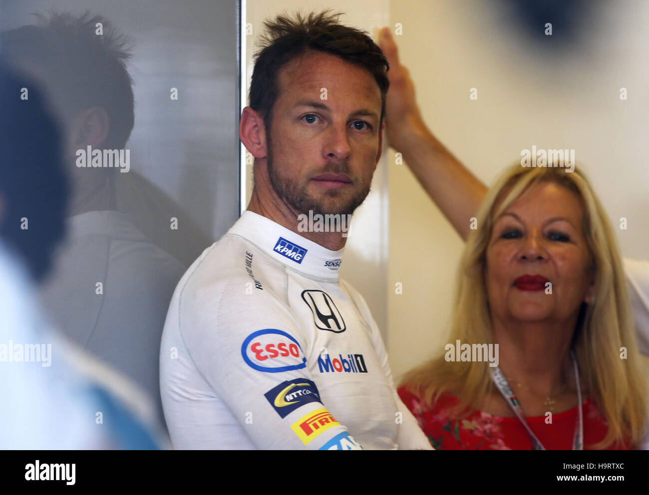 McLaren's Jenson Button and his mother Simone during practice at Yas ...