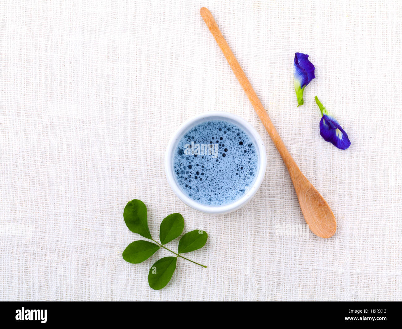 pigeon wing pea healthy drinking water on white table Stock Photo - Alamy