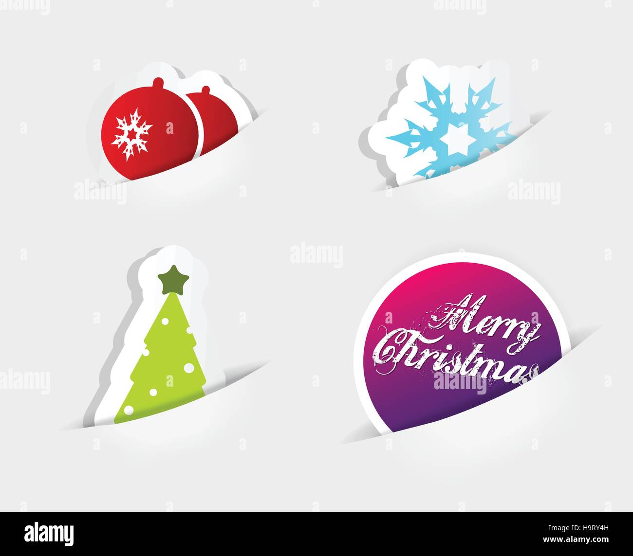 Four icons symbolizing Christmas slipped in to paper cut outs Stock ...