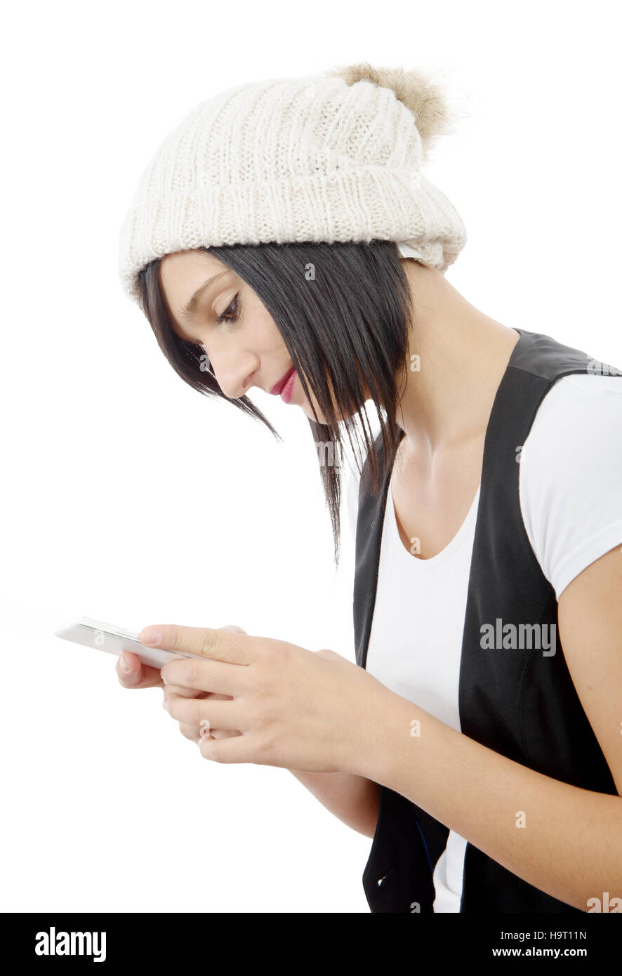 young brunette girl texting with mobile phone isolated on white ...