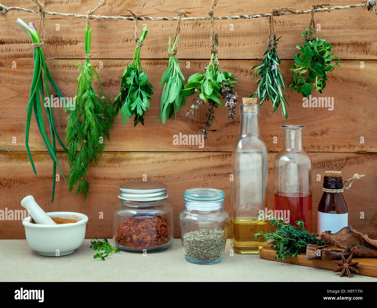 Assorted herb bundles hanging parsley ,sage,rosemary, dill,sprin Stock ...