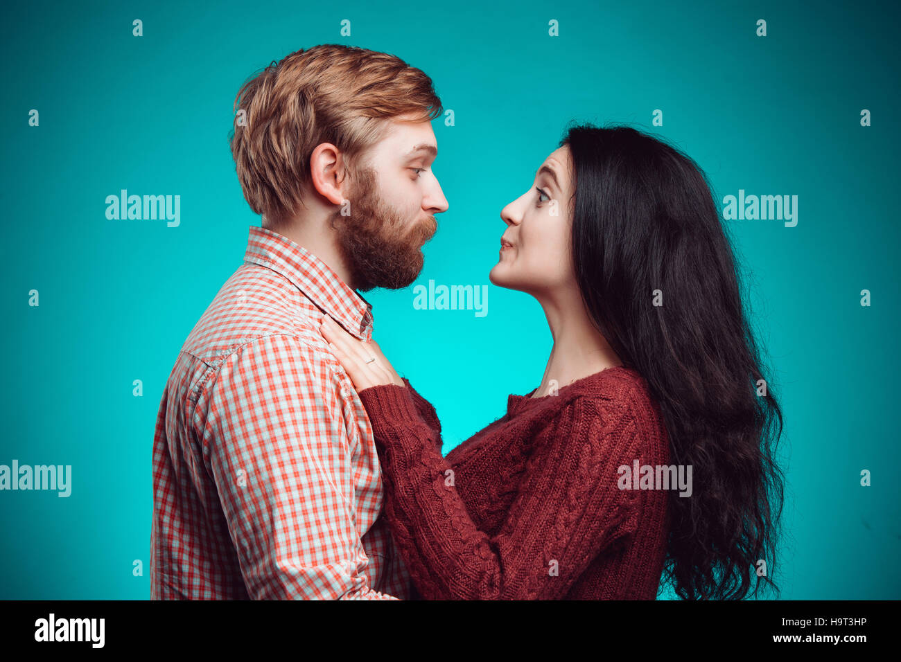 The embrace of young man and woman Stock Photo - Alamy