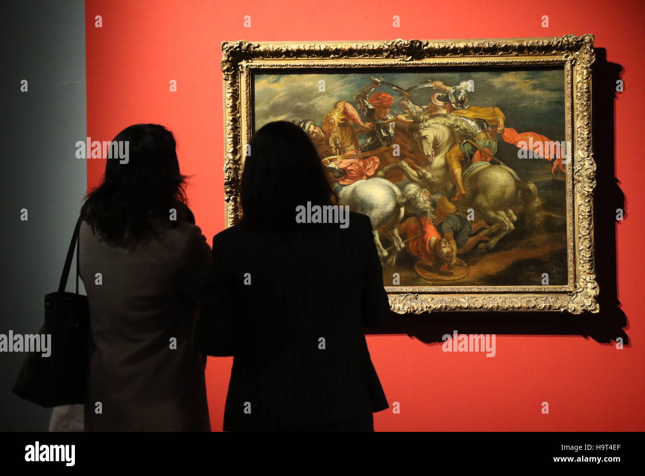 Visitors admiring an artwork on display at the 'Peter Paul Rubens and the Birth of Baroque ...