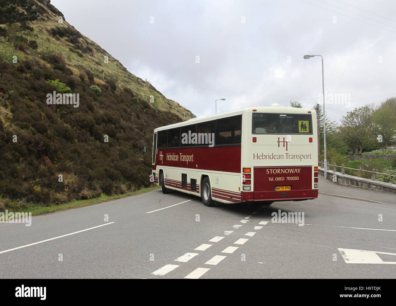 Hebridean Transport bus departing Tarbert Isle of Harris Scotland May ...