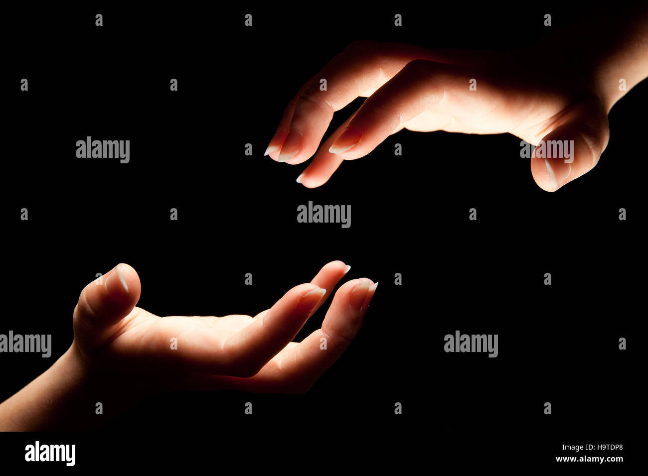 Hands reaching catching hi-res stock photography and images - Alamy