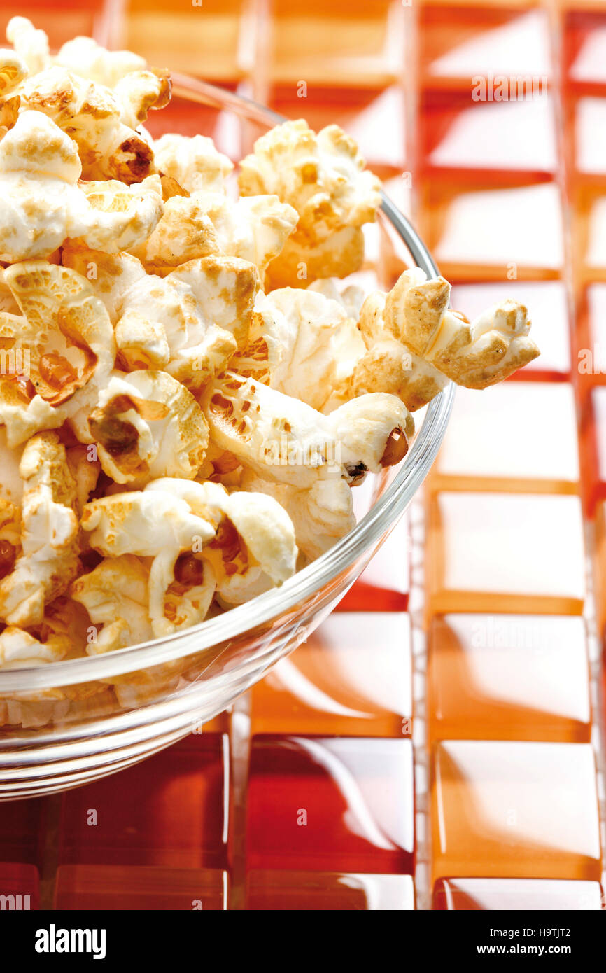 Popcorn in a glass bowl Stock Photo - Alamy