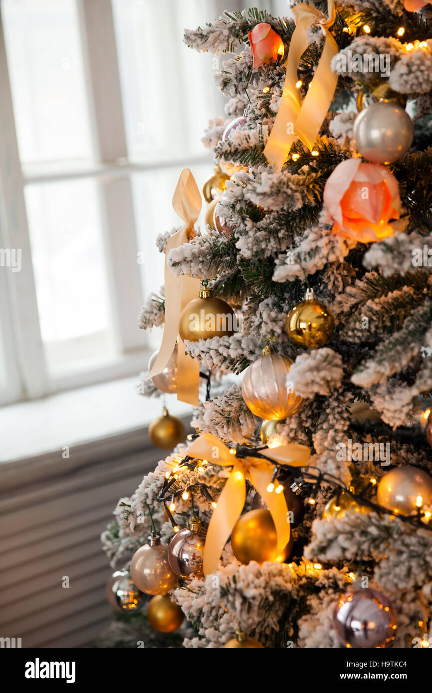 Green New Year tree decorated Stock Photo - Alamy