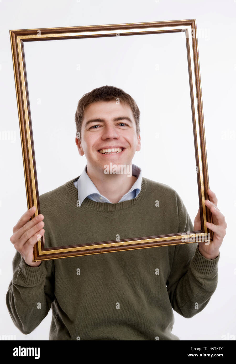 Laughing man in picture frame Stock Photo - Alamy