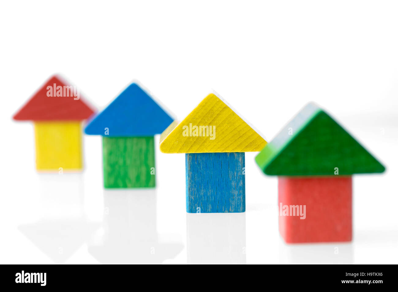 Small houses made of toy bricks Stock Photo - Alamy