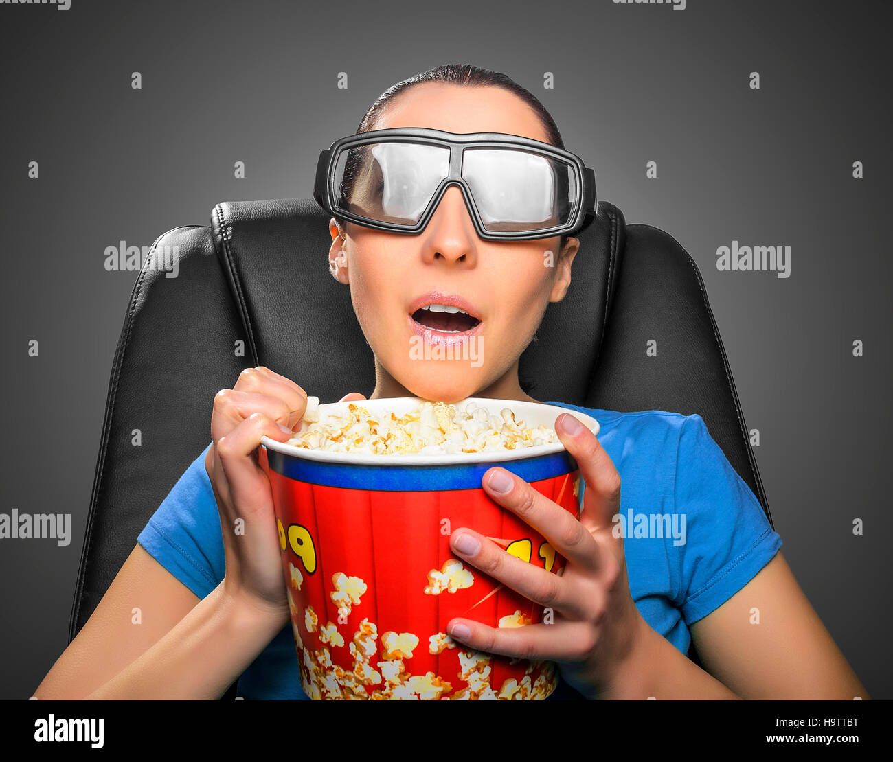 Viewer watching 3D cinema Stock Photo - Alamy