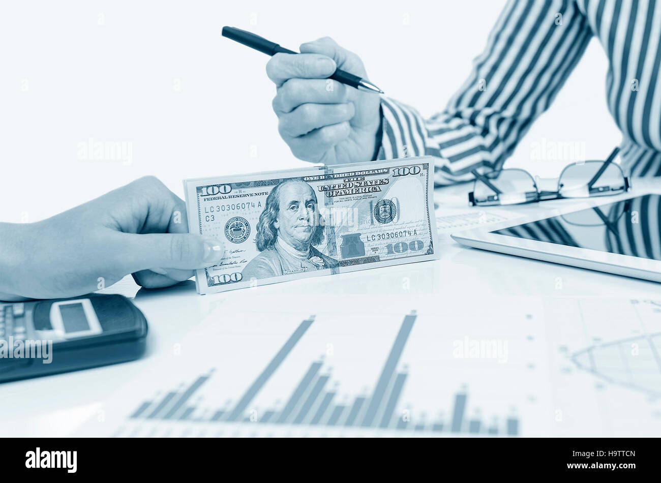 Business people exchanging dollar banknotes Stock Photo - Alamy