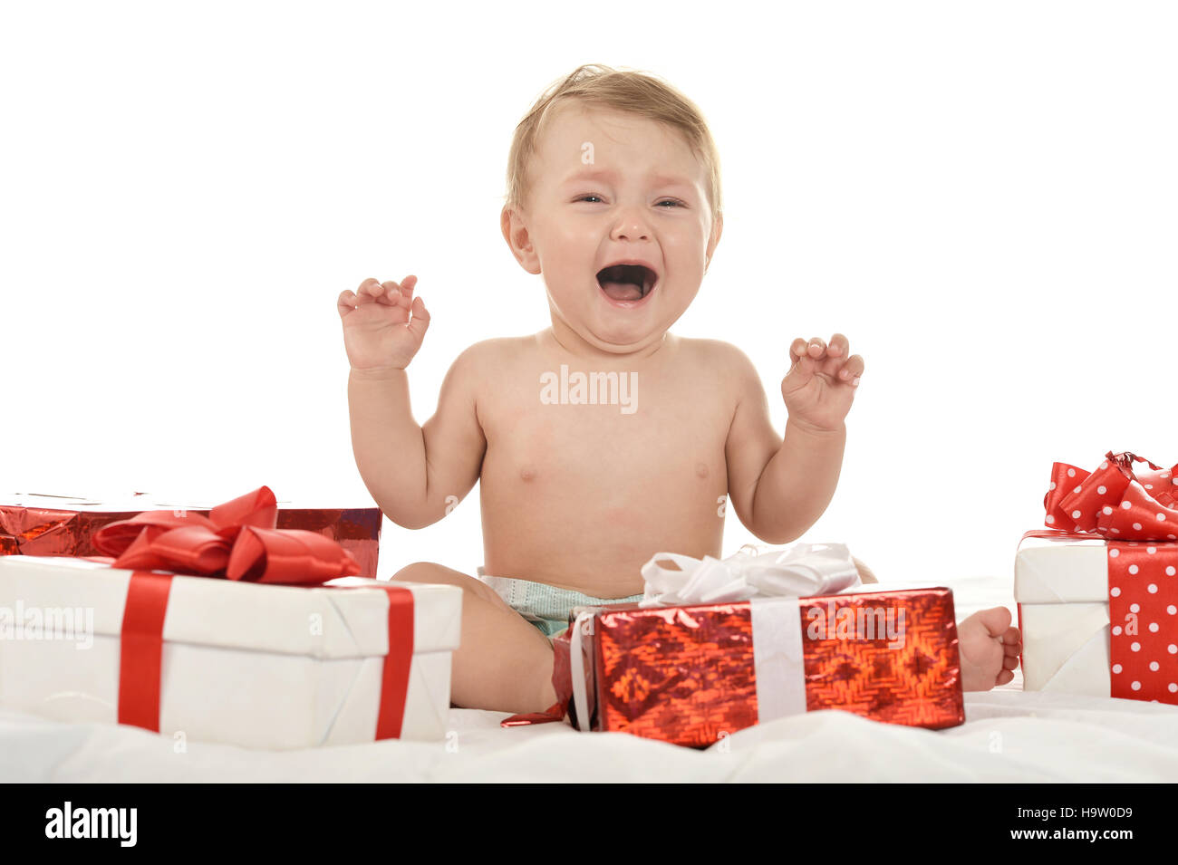 Cute baby with gift Stock Photo - Alamy