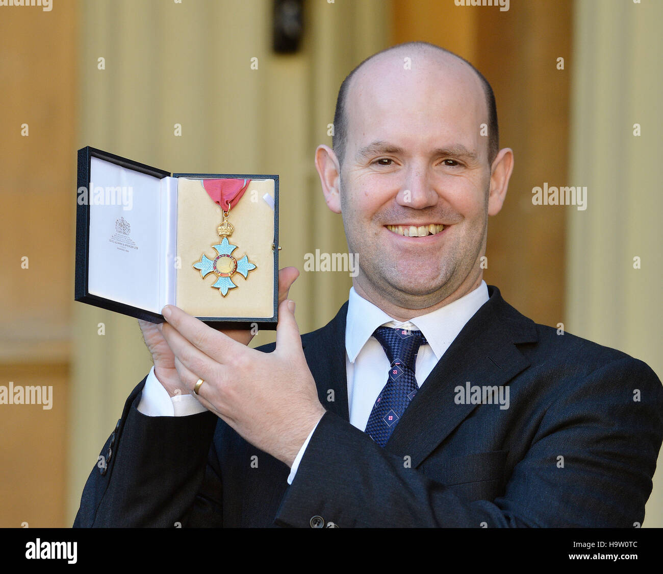 Dr Eben Upton holds his CBE which was was presented to him by the ...
